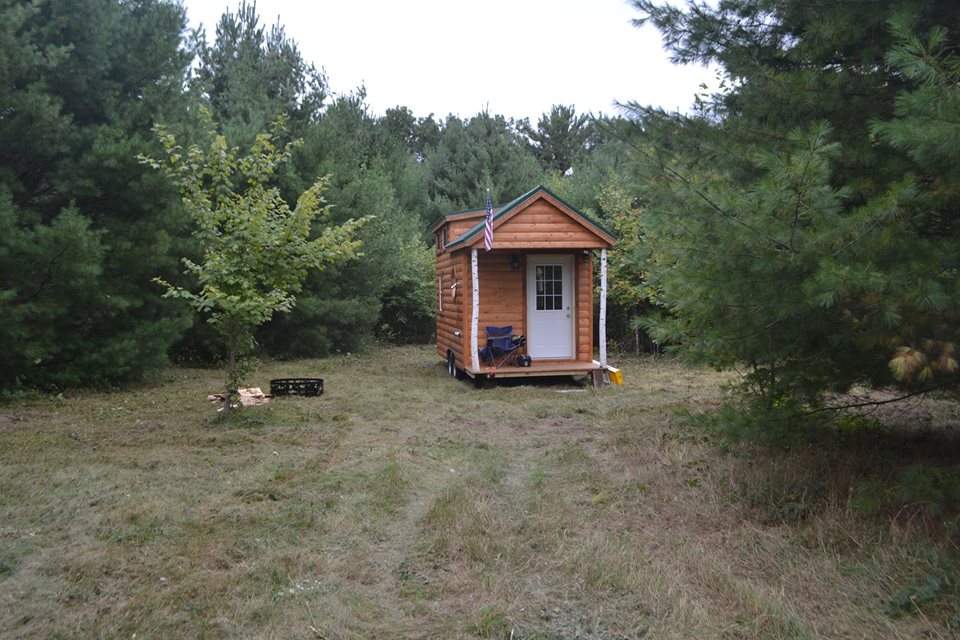 Tiny Log Cabin on Wheels by Rolling Cabins