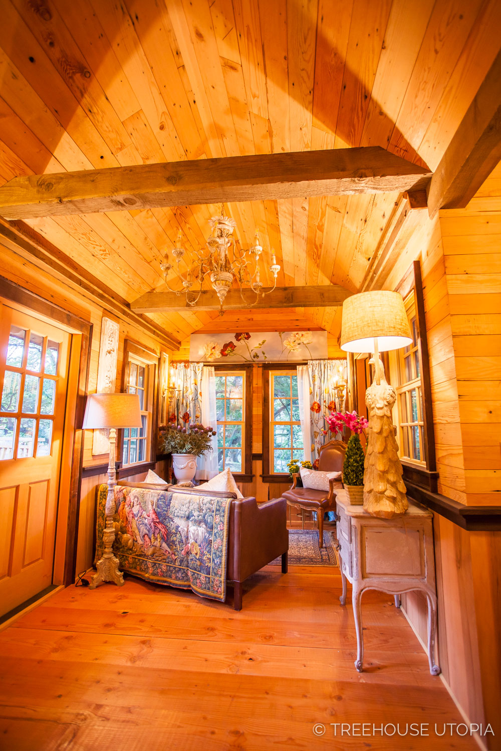 Chateau Treehouse Suspended in Three Towering Cypress Trees