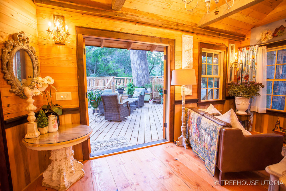 Chateau Treehouse Suspended in Three Towering Cypress Trees