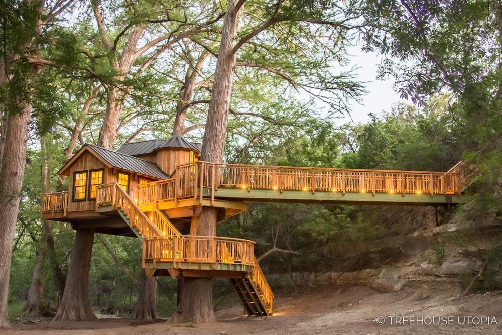 Chateau Treehouse Suspended in Three Towering Cypress Trees