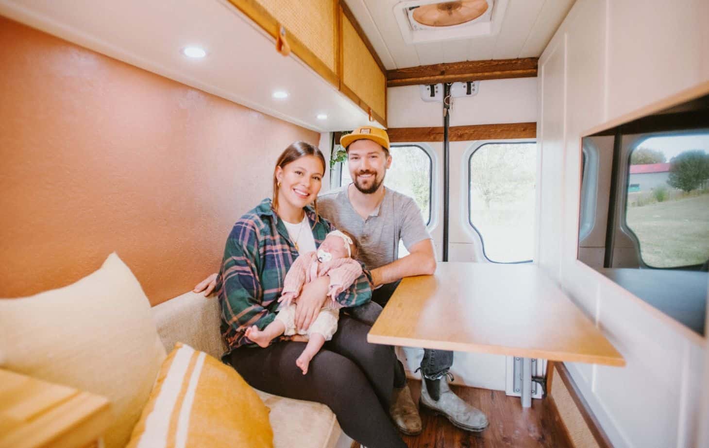 Couple & Baby in Southwest-Inspired Van with a Murphy Bed