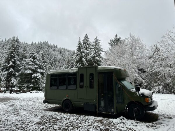 Their Forest-Green Shuttle Bus Conversion