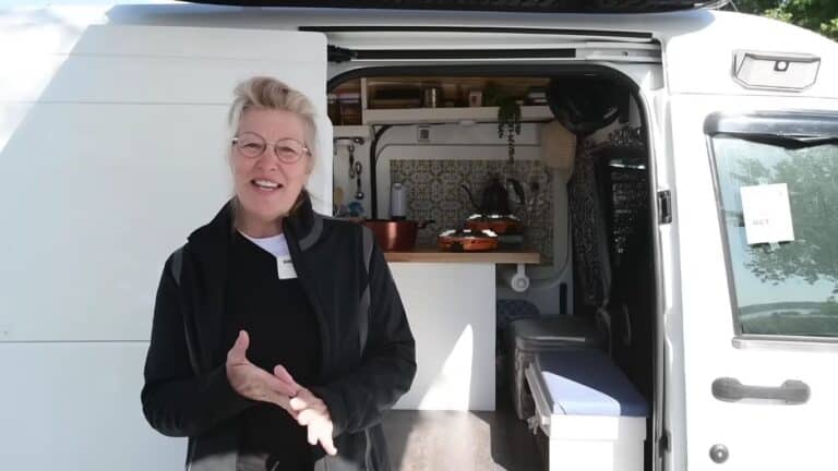 Cynthia & Her Dog in Their Ford Transit Connect Conversion