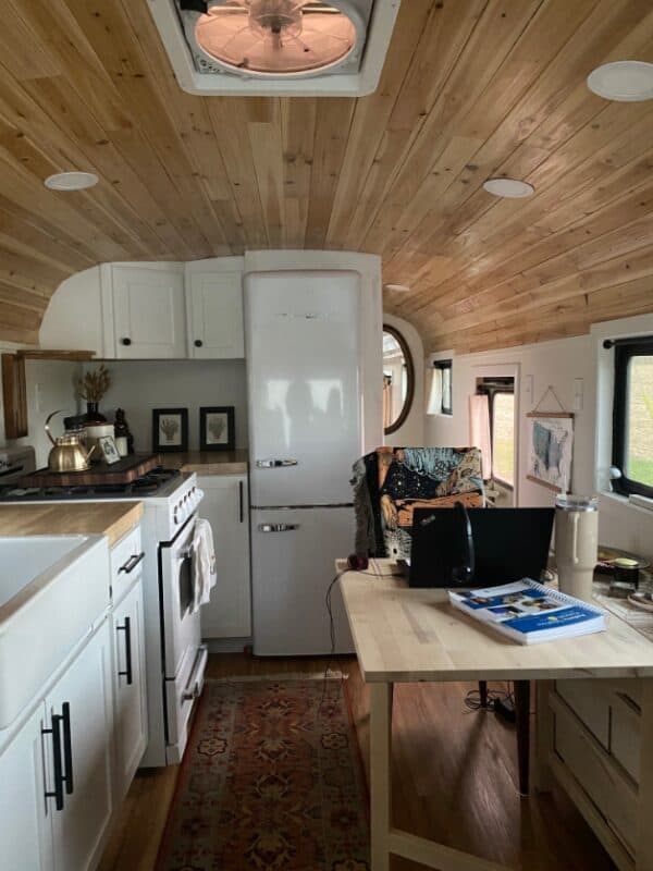 Traveling in their Vintage Bus Conversion