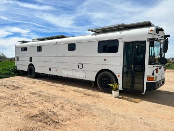 Traveling in their Vintage Bus Conversion
