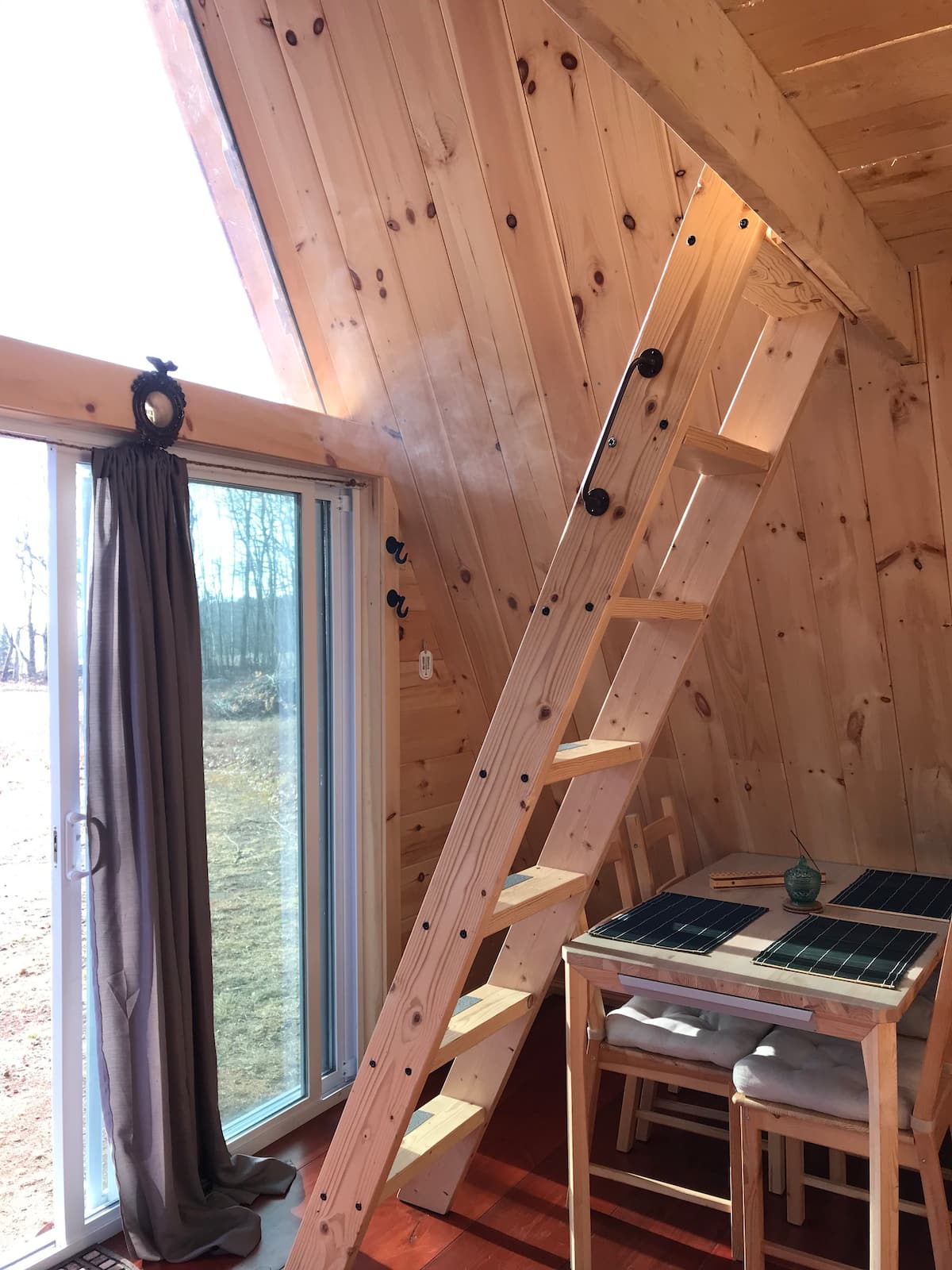Solar-powered ‘G-frame’ Cabin with Sauna