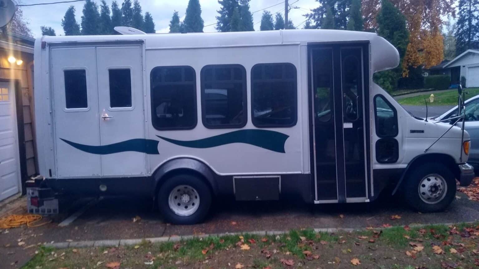 His Comic Book Theme Shuttle Bus Tiny Home