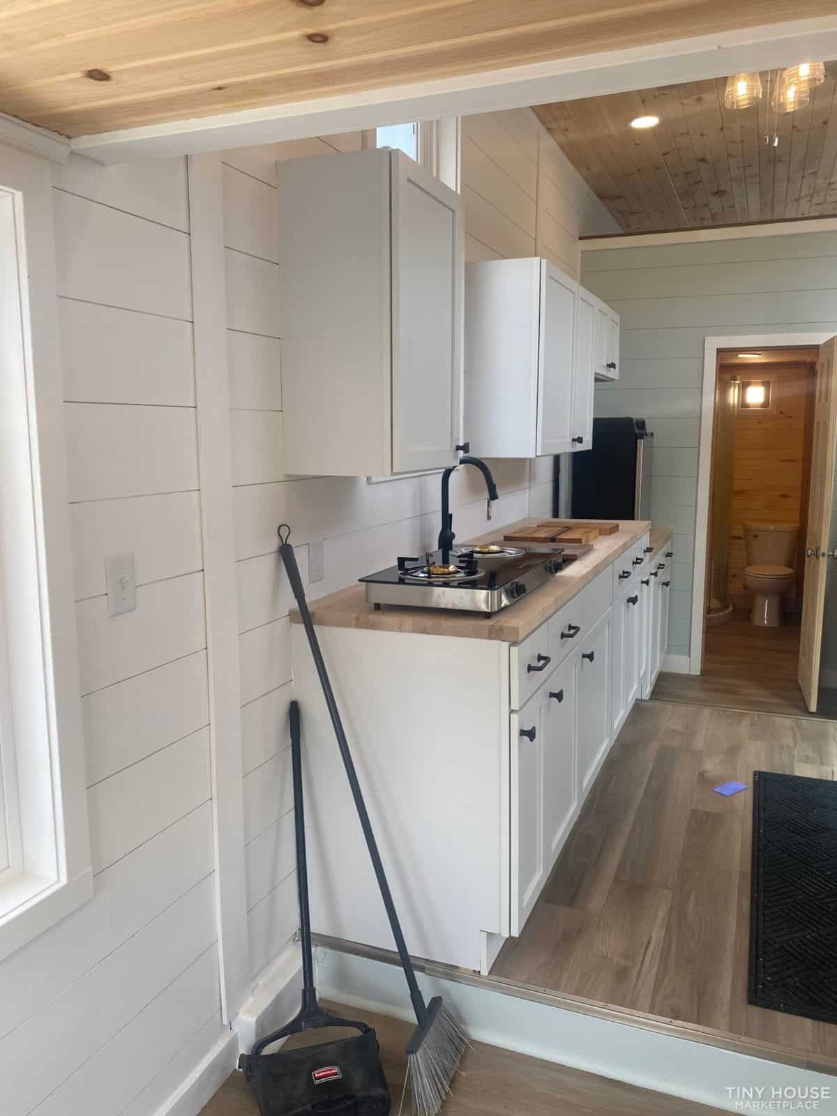 High School Students Built This 32-Foot Tiny House with Dual Lofts