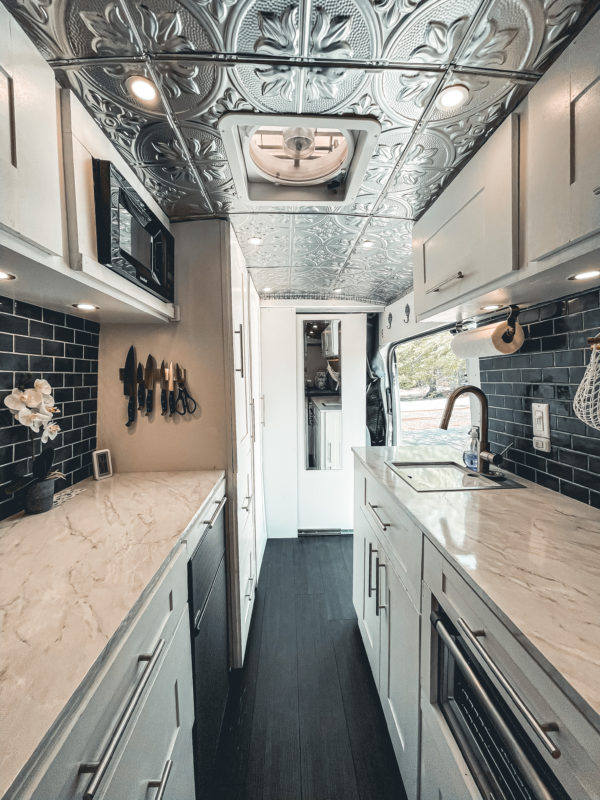 Lauren & Her Dad Built Out this Stunning Blue & White Van