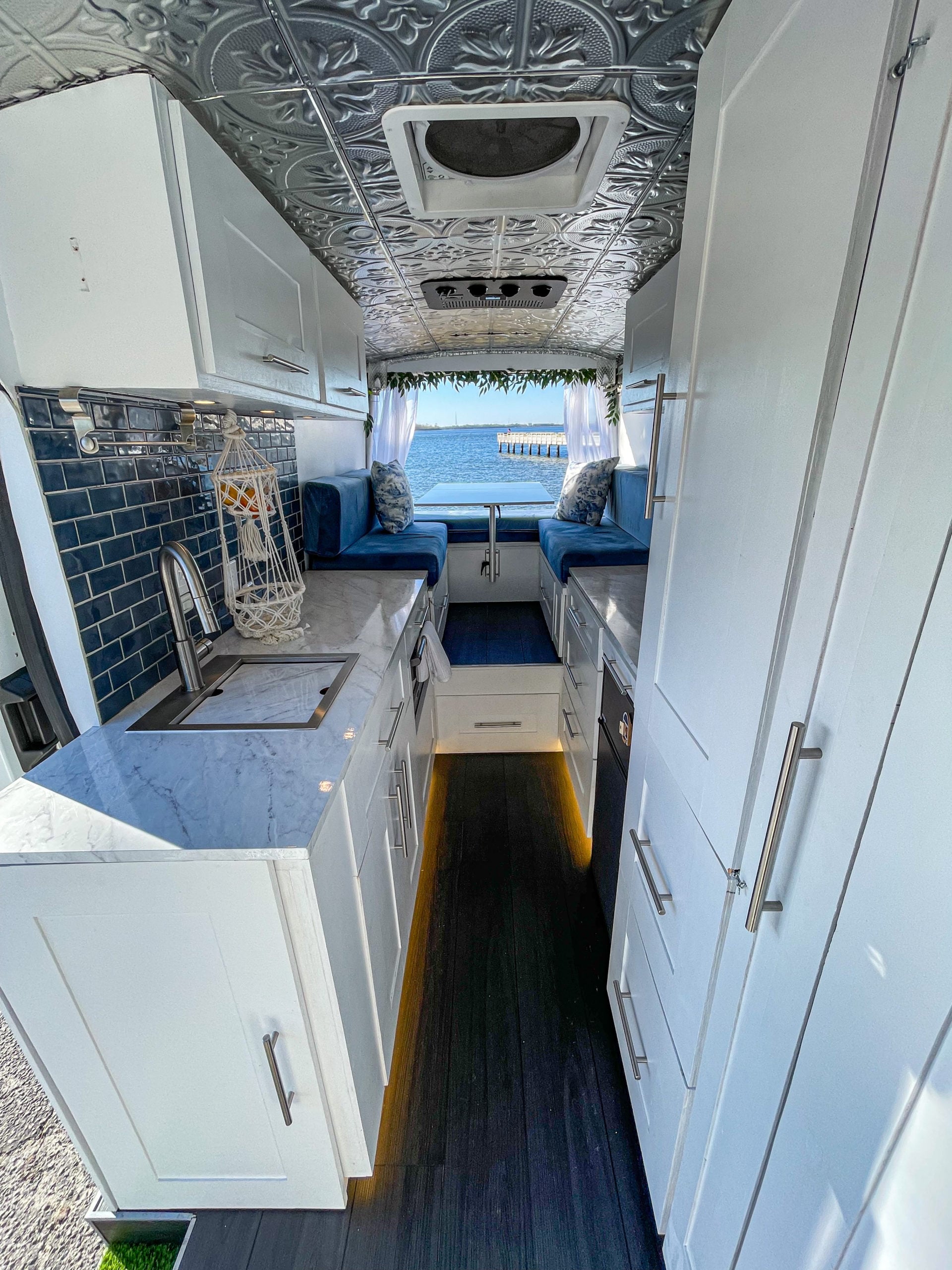 Lauren & Her Dad Built Out this Stunning Blue & White Van