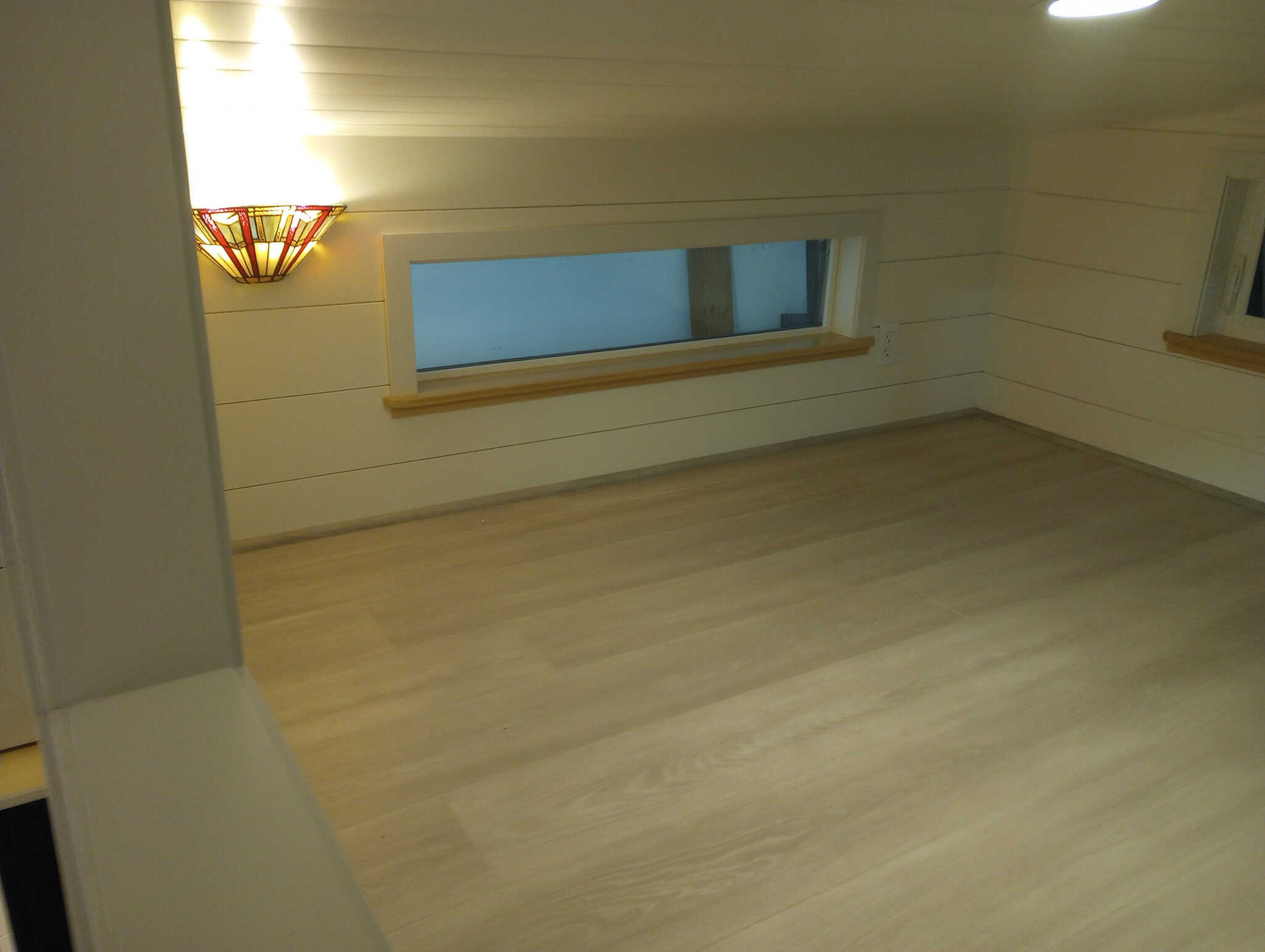This First Floor Bedroom Tiny House has 3 Sleeping Areas