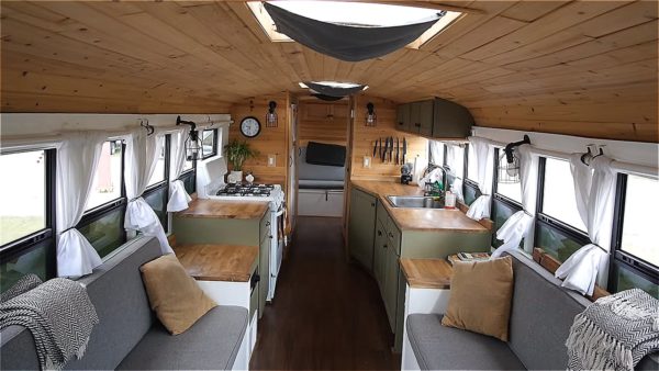 School Bus Conversion With a Rooftop Deck That Sleeps Six!