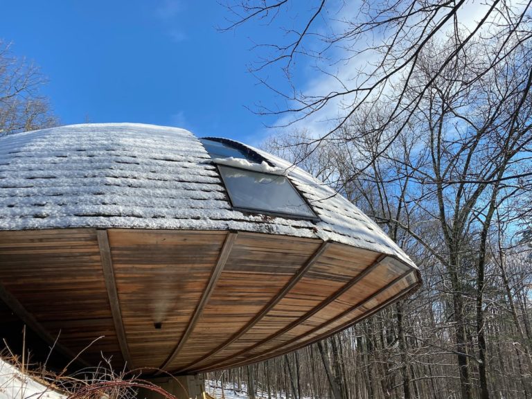 This Round, Rustic Cabin is Shaped like a UFO!