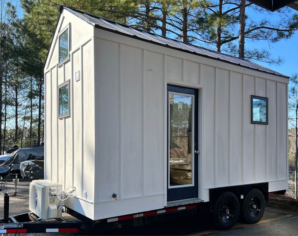 Pull-Out Under-Floor Bed in This Tiny House for Sale