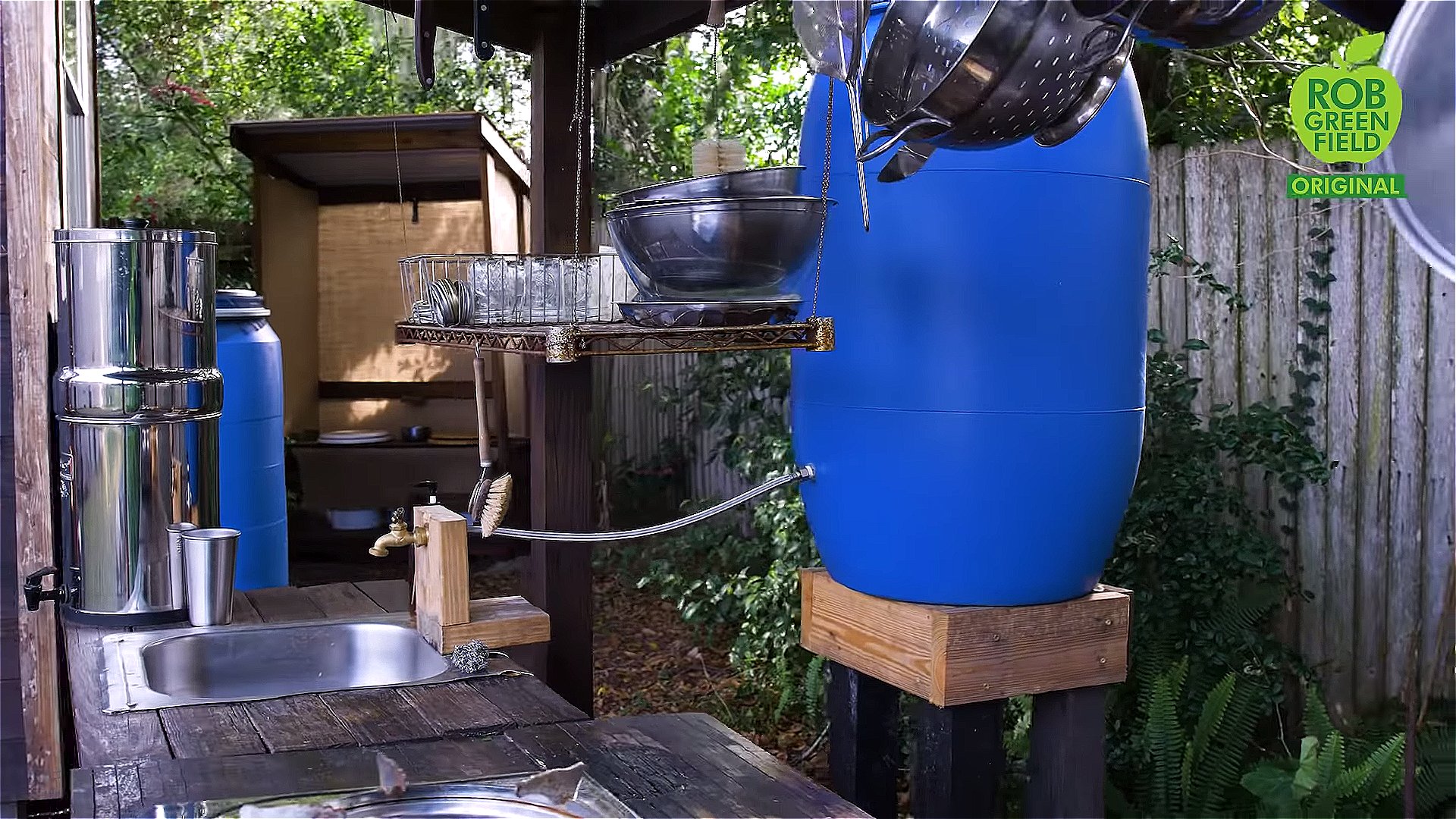 He built a tiny house for $1.5k and grows his own food too