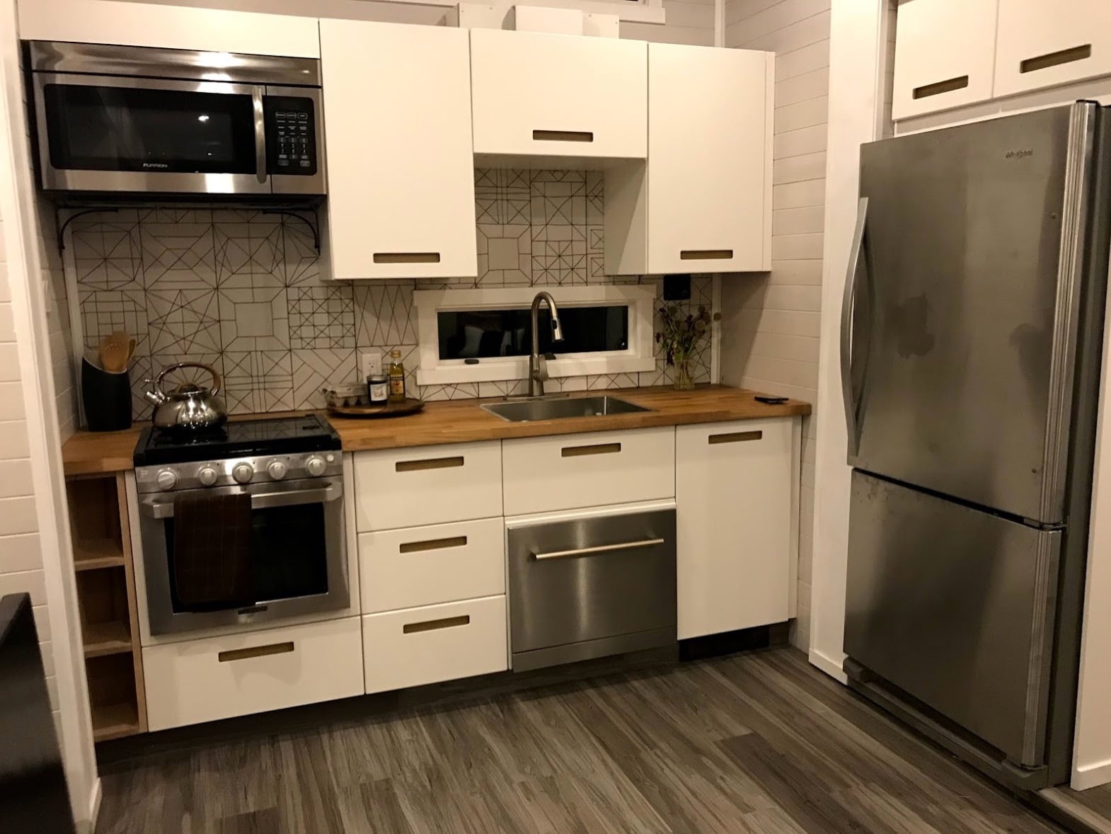 Couple’s Expanding Tiny House on Wheels Almost Doubles in Space with ...