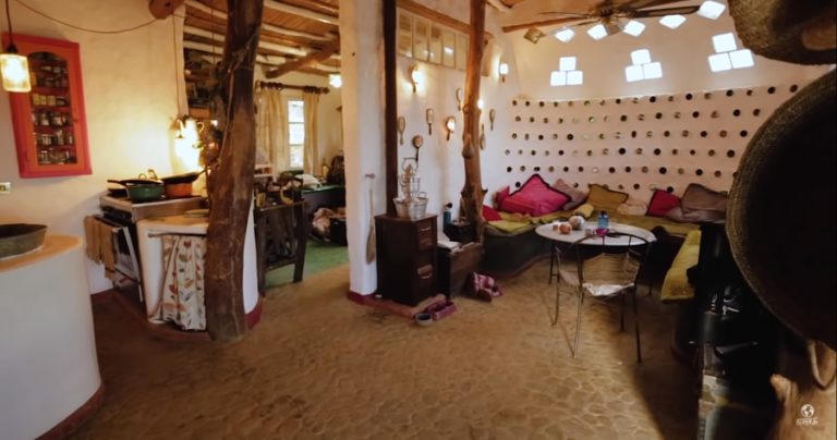 She Built A Tiny Cottage (& Entire Eco Village) With Adobe