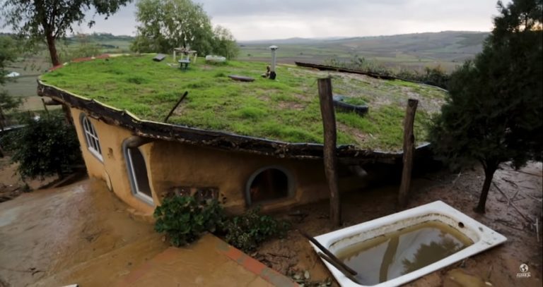 She Built A Tiny Cottage (& Entire Eco Village) With Adobe