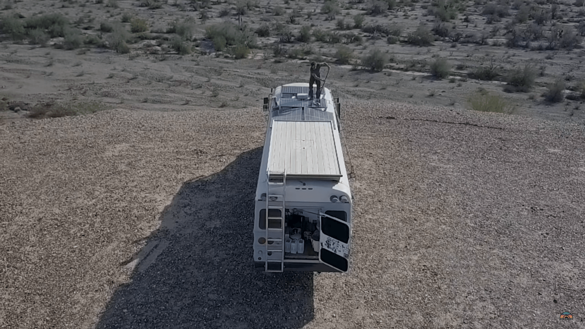 Solar-Powered Bus Conversion with Room for Books (And a Sewing Machine!)