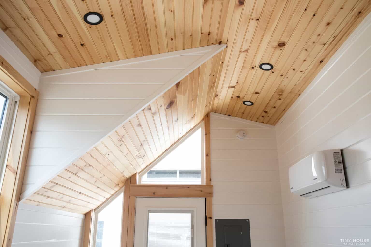 Contemporary Black-and-Pine Tiny House on Wheels