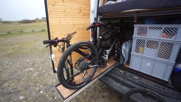Explore a Stunning Custom Van Conversion with Sliding Bed