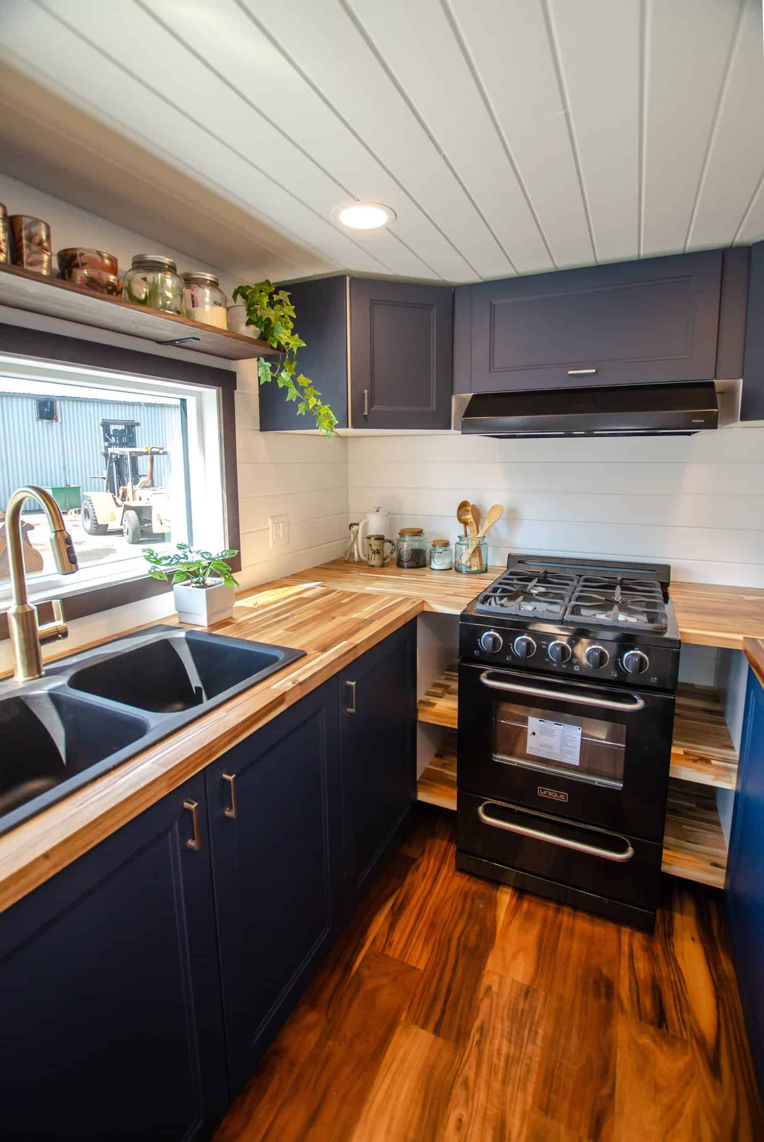 The Raven: 30’ X 8’6” Tiny House by Rewild Homes