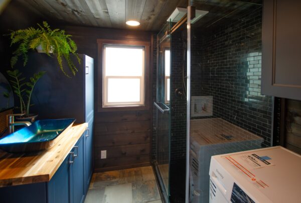 The Raven: 30’ X 8’6” Tiny House by Rewild Homes