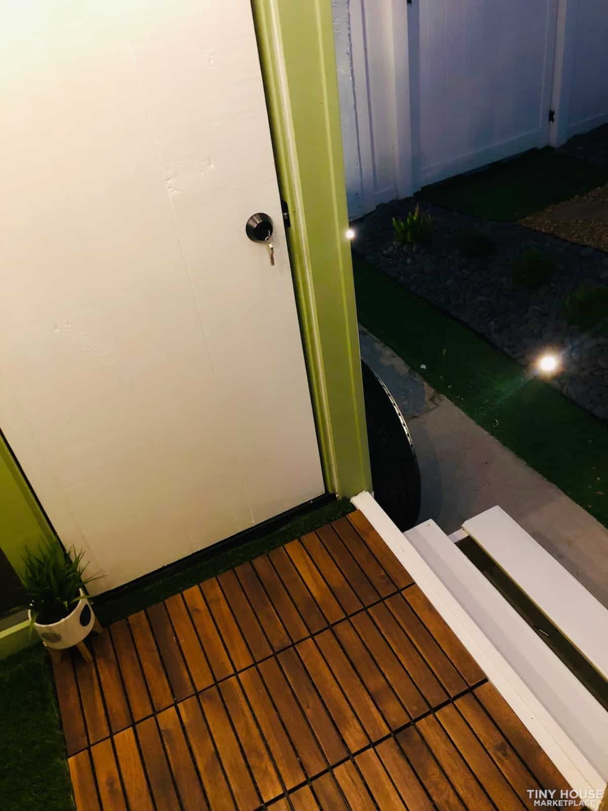 $15K Micro House on Wheels with Built-in Breezeway