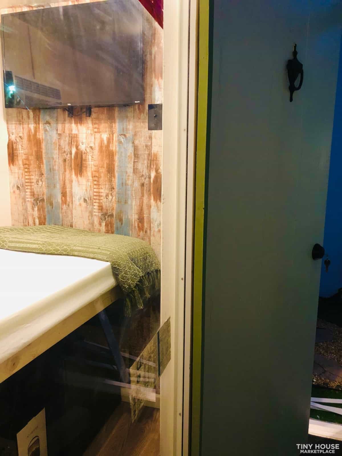 $15K Micro House on Wheels with Built-in Breezeway