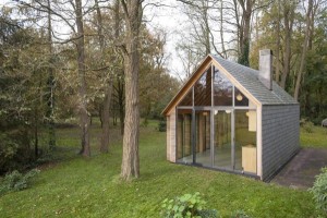 Tiny Dutch Garden Cottage with Wooden Shutters