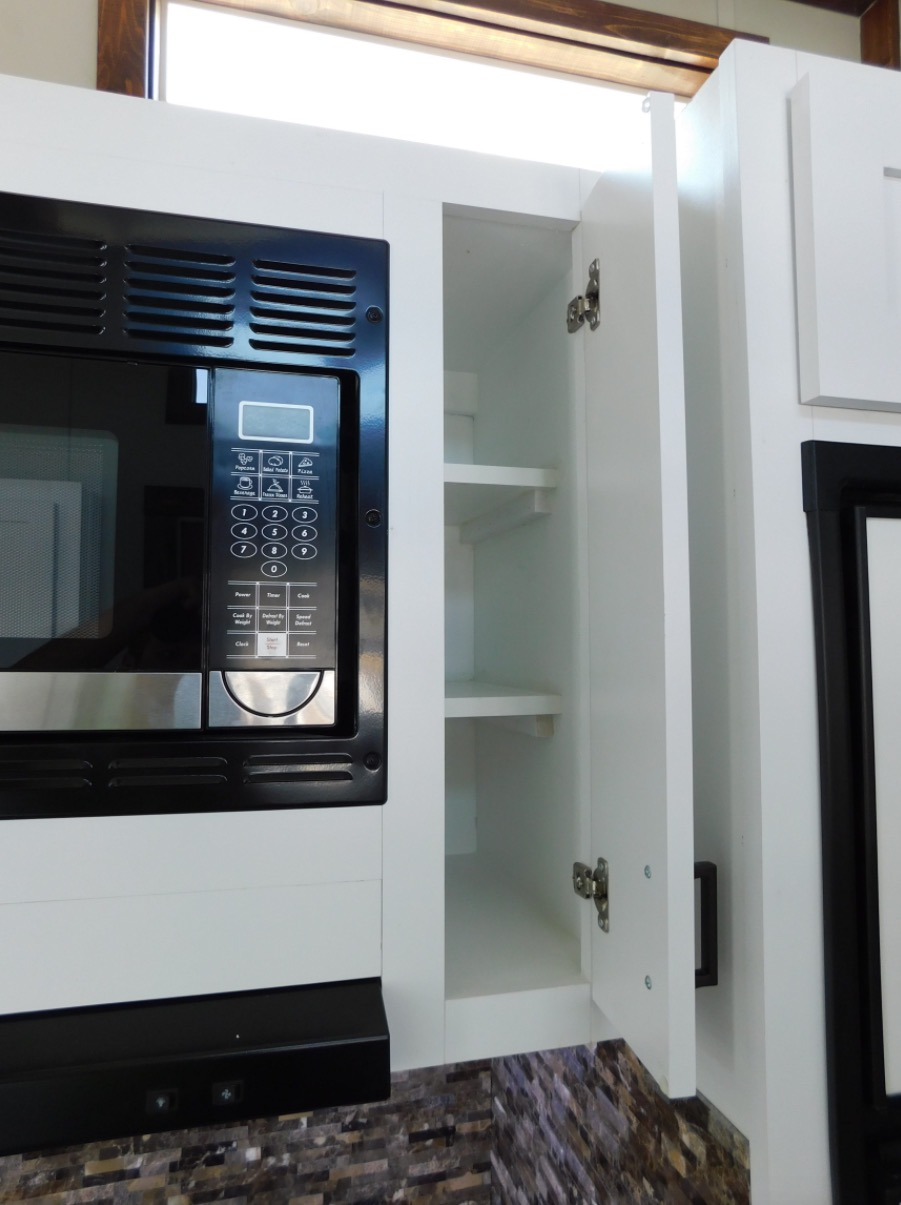 Tiny House Toy Hauler RV: A Tiny House on Wheels with a Garage!