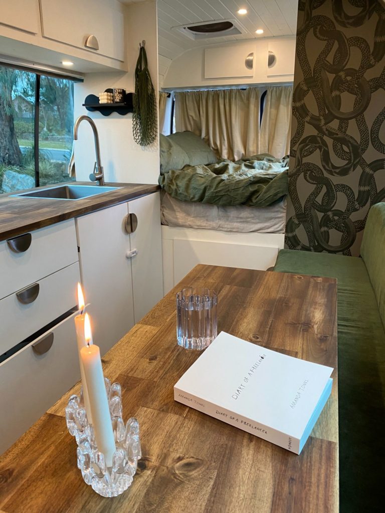 Australian Couple Turn a Toyota Coaster Bus into their Tiny Home
