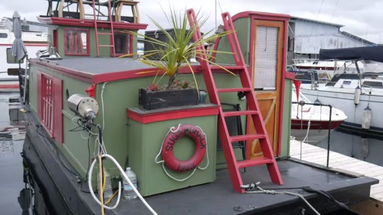 Trash Barge Turned to Floating Tiny Home