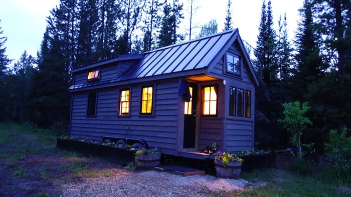 Woman’s Triple Axle Tumbleweed Tiny House