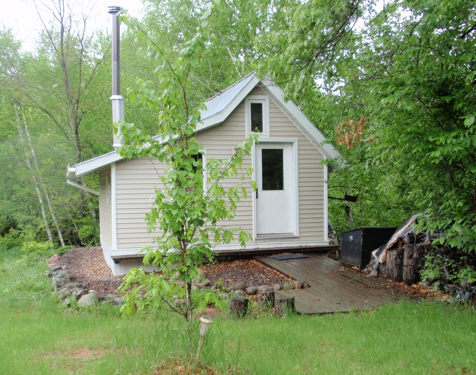 Tiny Cottage Under a Treehouse