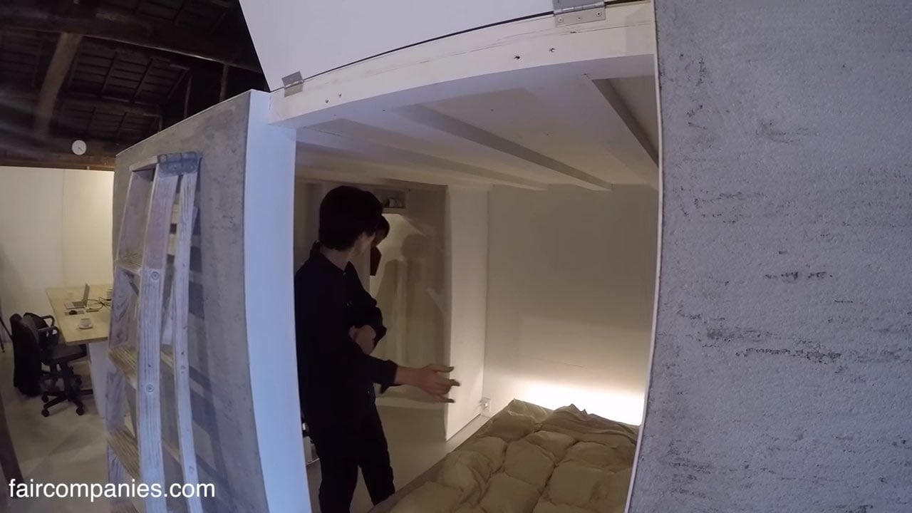 Tiny Cube House Built within Office Space to Use as Home