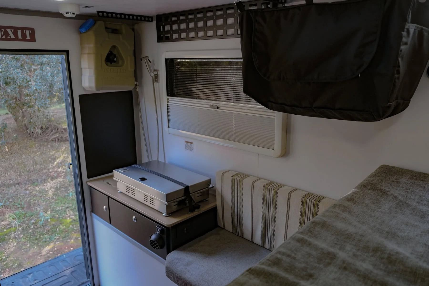 The El Cap Truck Camper with Rooftop Tent and Solar Panels by Tribe ...
