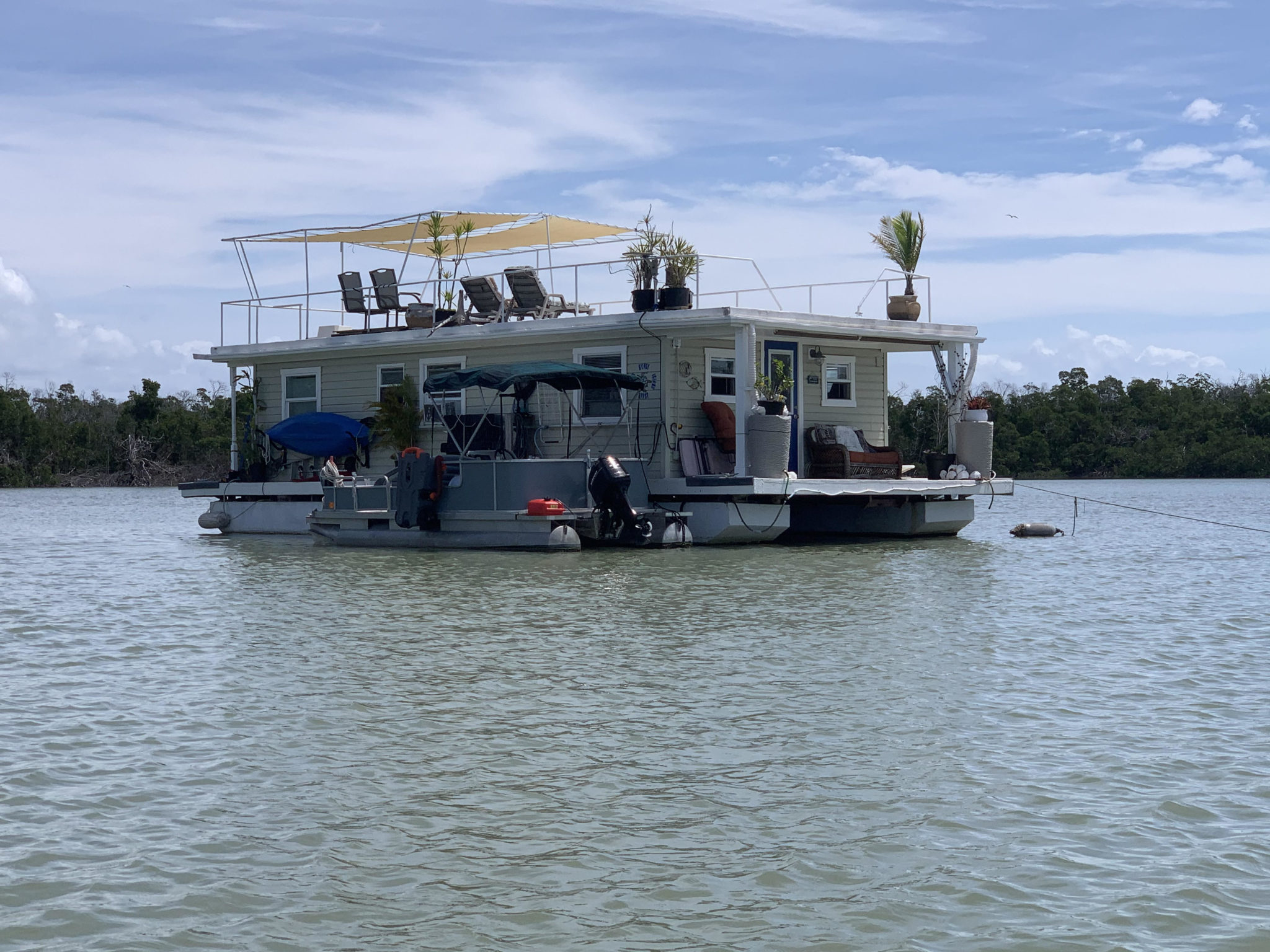 Couple’s Off-Grid Floating Home Lifestyle in Florida