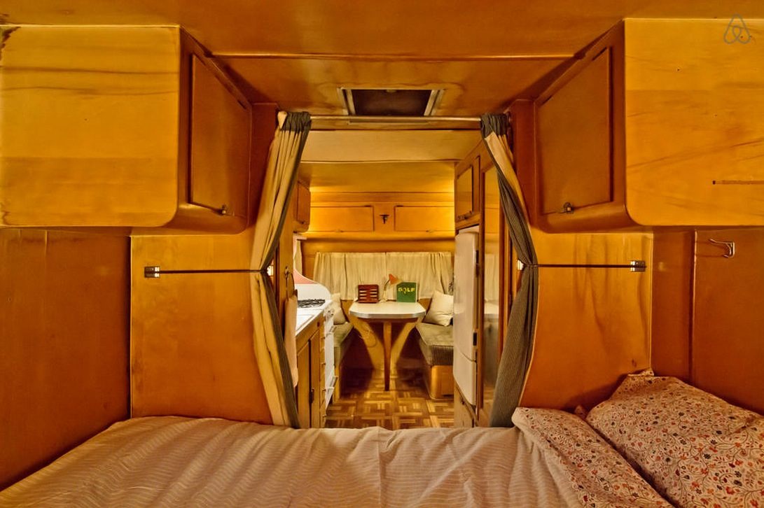 ’54 Alhoa 16′ Travel Trailer inside 6000 Sq. Ft. Warehouse