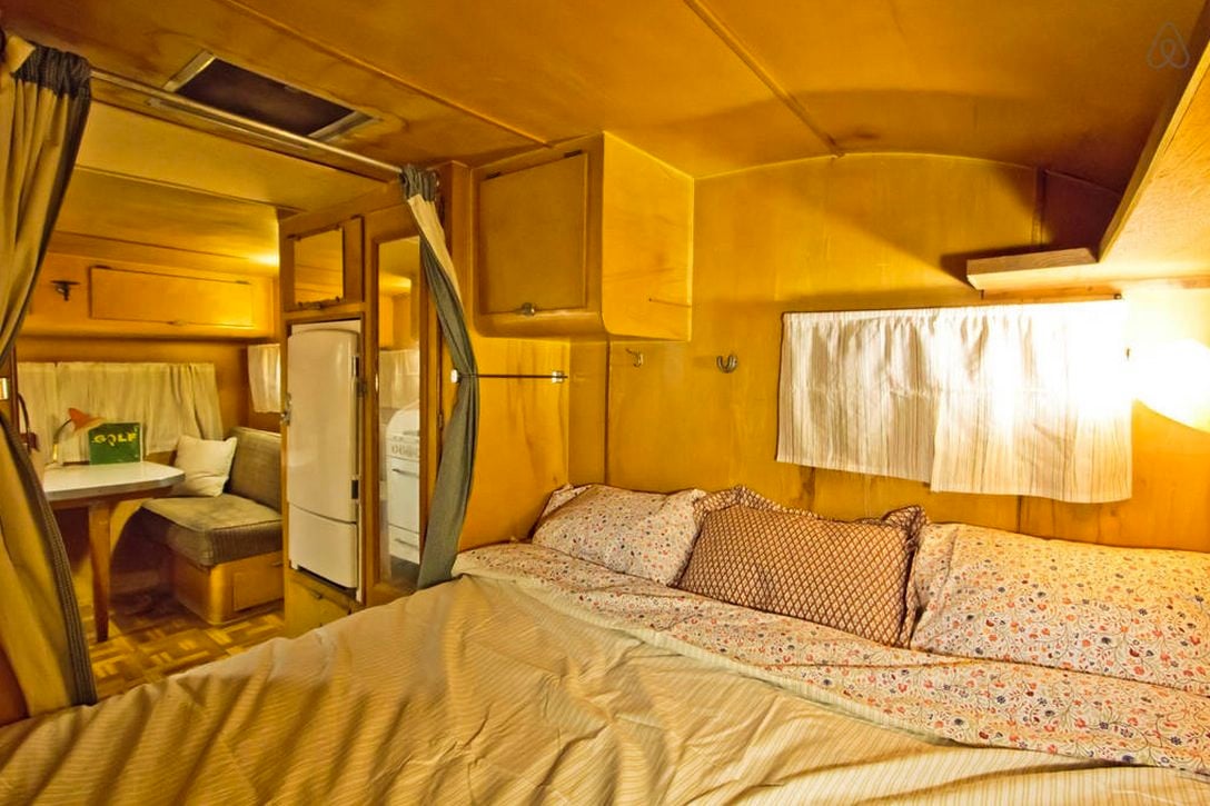 ’54 Alhoa 16′ Travel Trailer inside 6000 Sq. Ft. Warehouse