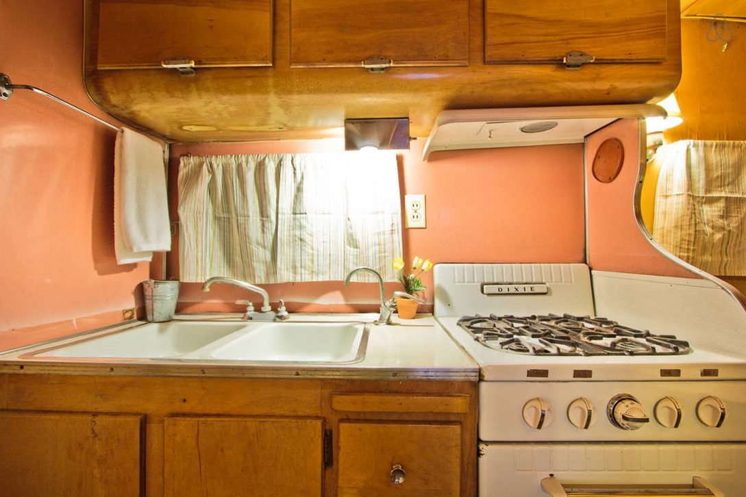 ’54 Alhoa 16′ Travel Trailer inside 6000 Sq. Ft. Warehouse