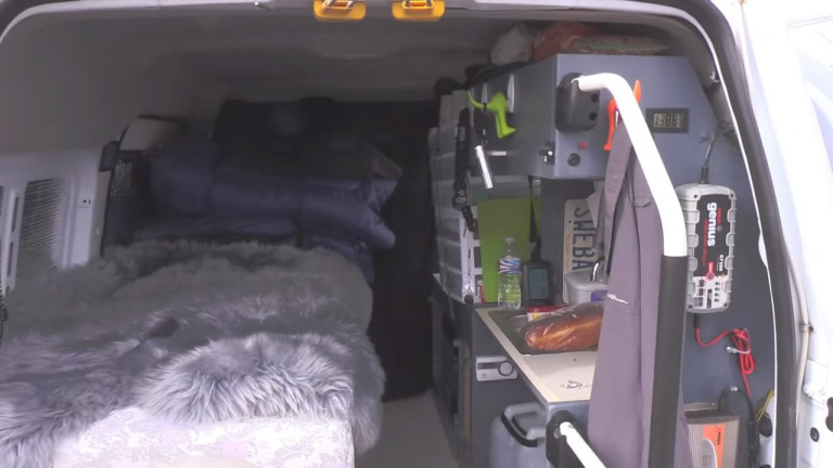 Woman Living Solo in her Ford Transit Connect Van