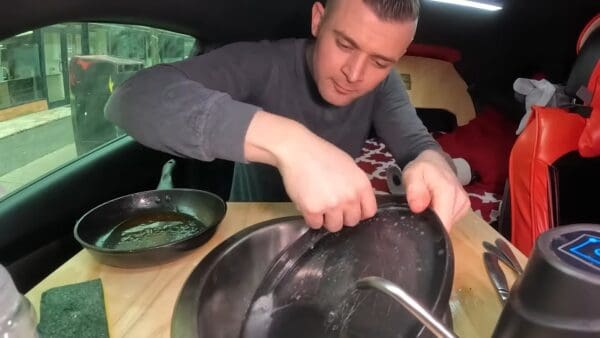 Life in his Self-Converted Chevy Camaro Camper
