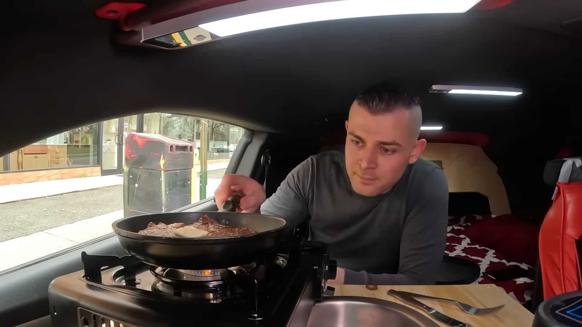 Life in his Self-Converted Chevy Camaro Camper