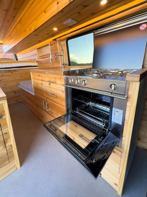Zephyr Van: Professional Conversion with Indoor Shower, Oven, and Sleeps 3